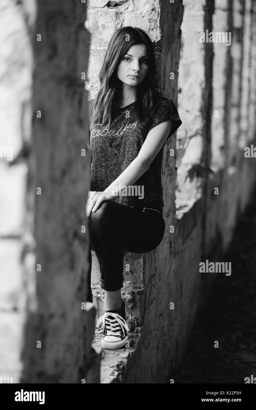 Sad depressed woman in old building Stock Photo - Alamy