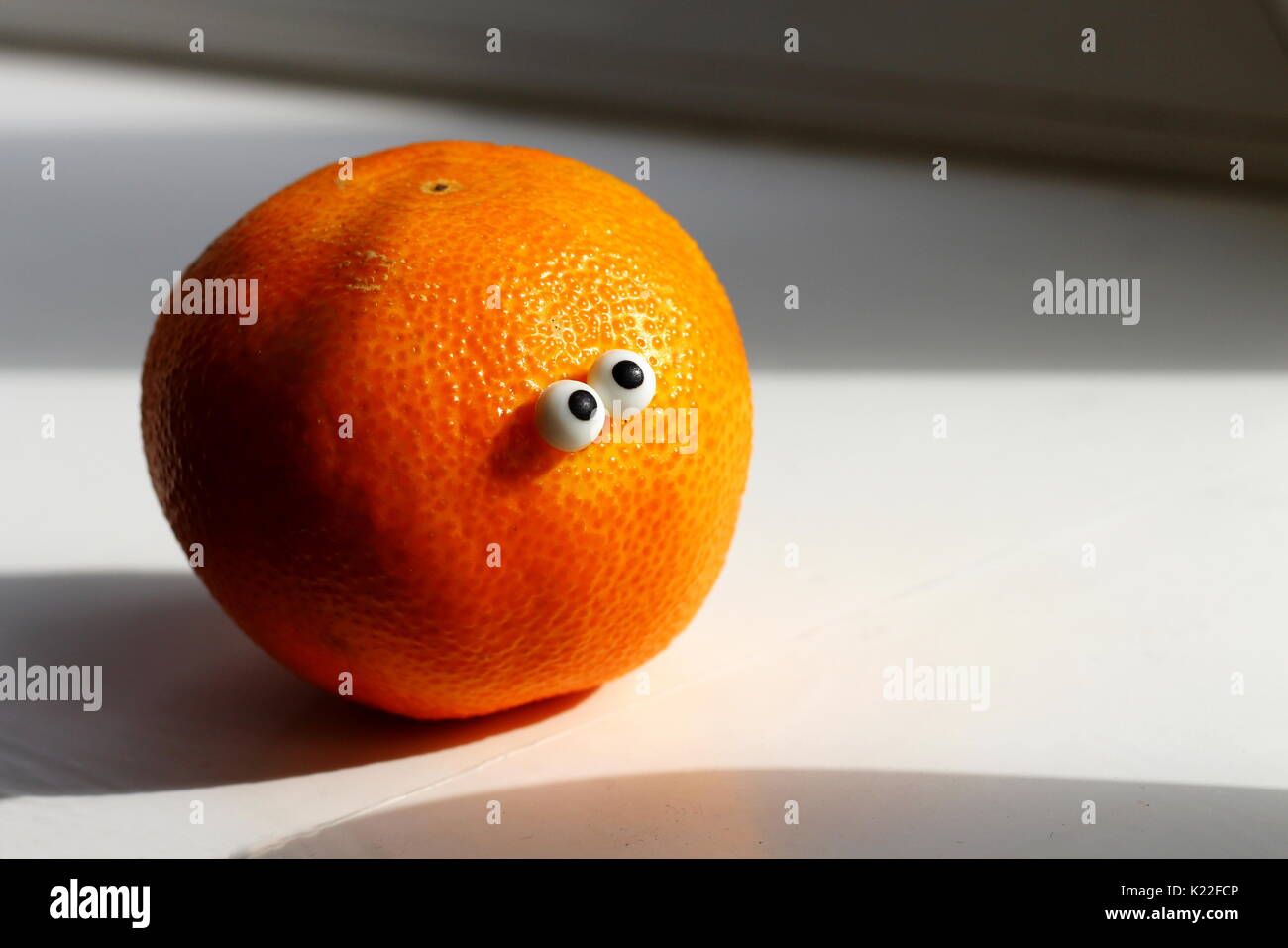 Orange feels sad alone in the world Stock Photo - Alamy