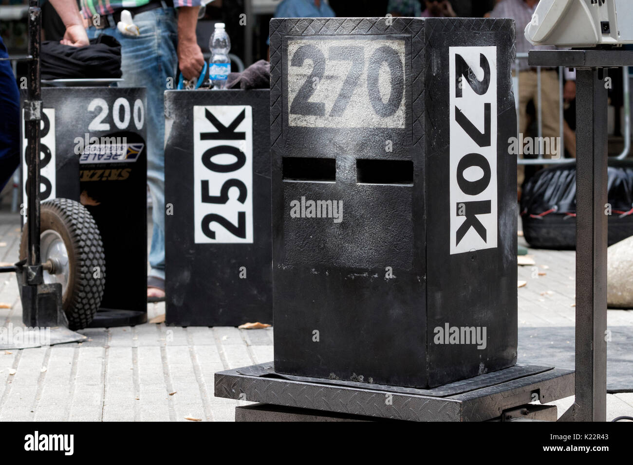 Black 270 kilo weight on a scale Stock Photo - Alamy