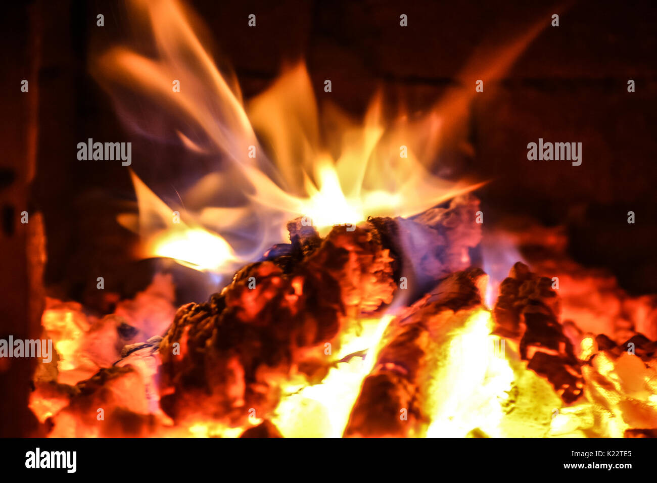 Fire burning inside a brick stove - wood, ash, flames Stock Photo - Alamy