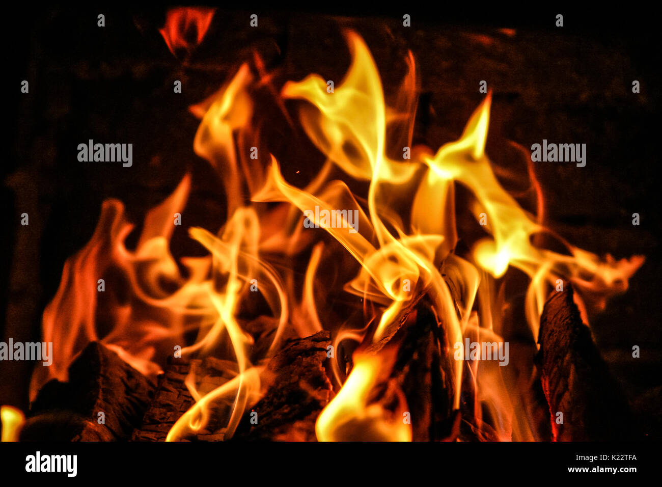 Fire burning inside a brick stove - wood, ash, flames Stock Photo - Alamy