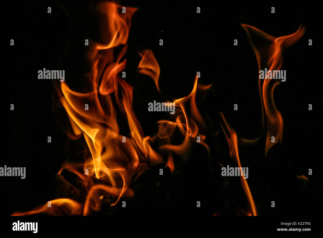 Fire burning inside a brick stove - wood, ash, flames Stock Photo - Alamy