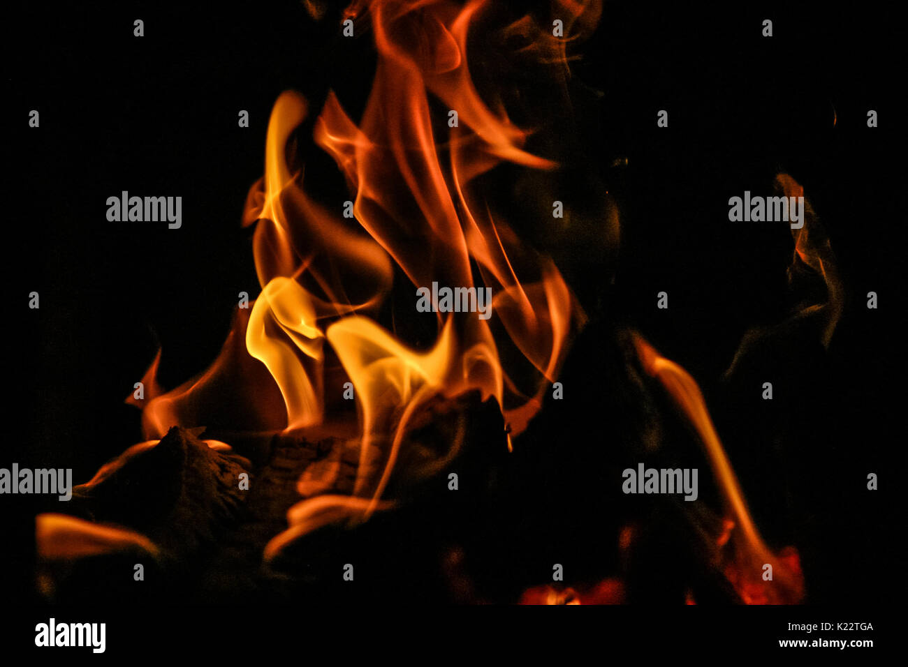 Fire burning inside a brick stove - wood, ash, flames Stock Photo - Alamy