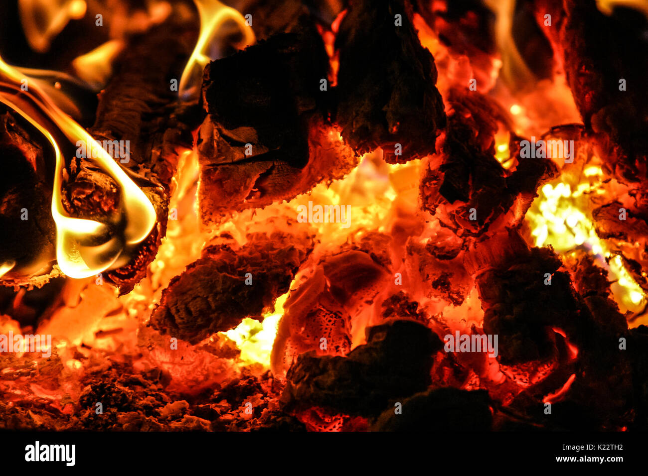 Fire burning inside a brick stove - wood, ash, flames Stock Photo - Alamy