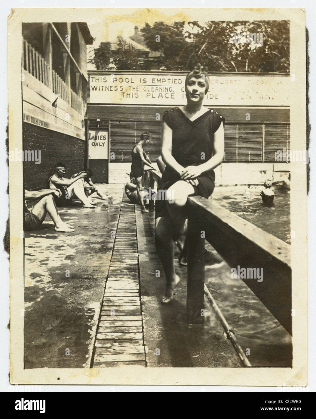 Woman in Bathing Costume and Other Swimmers at Pool's Edge, Houston ...