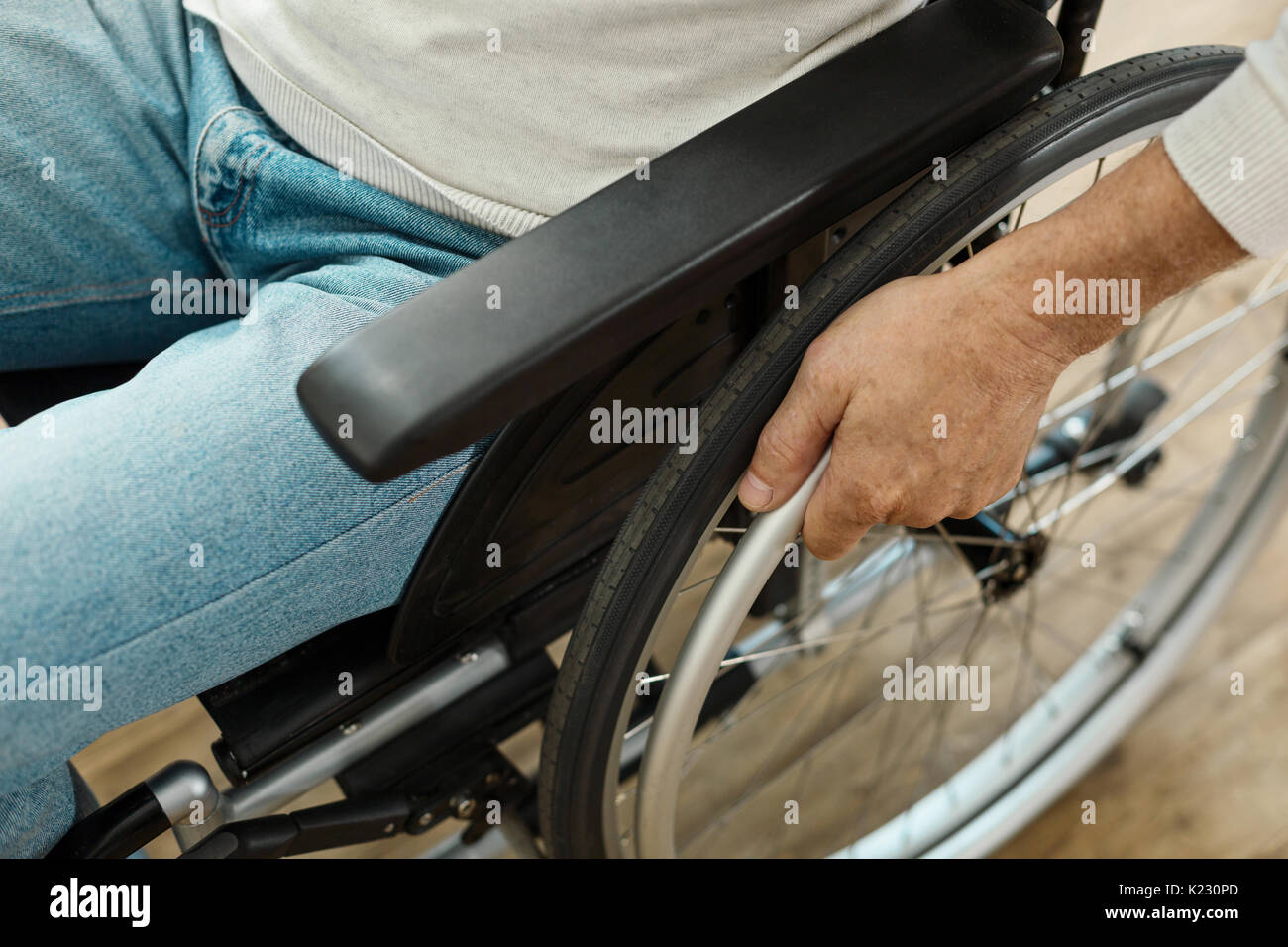 Modern wheelchair being in use Stock Photo - Alamy