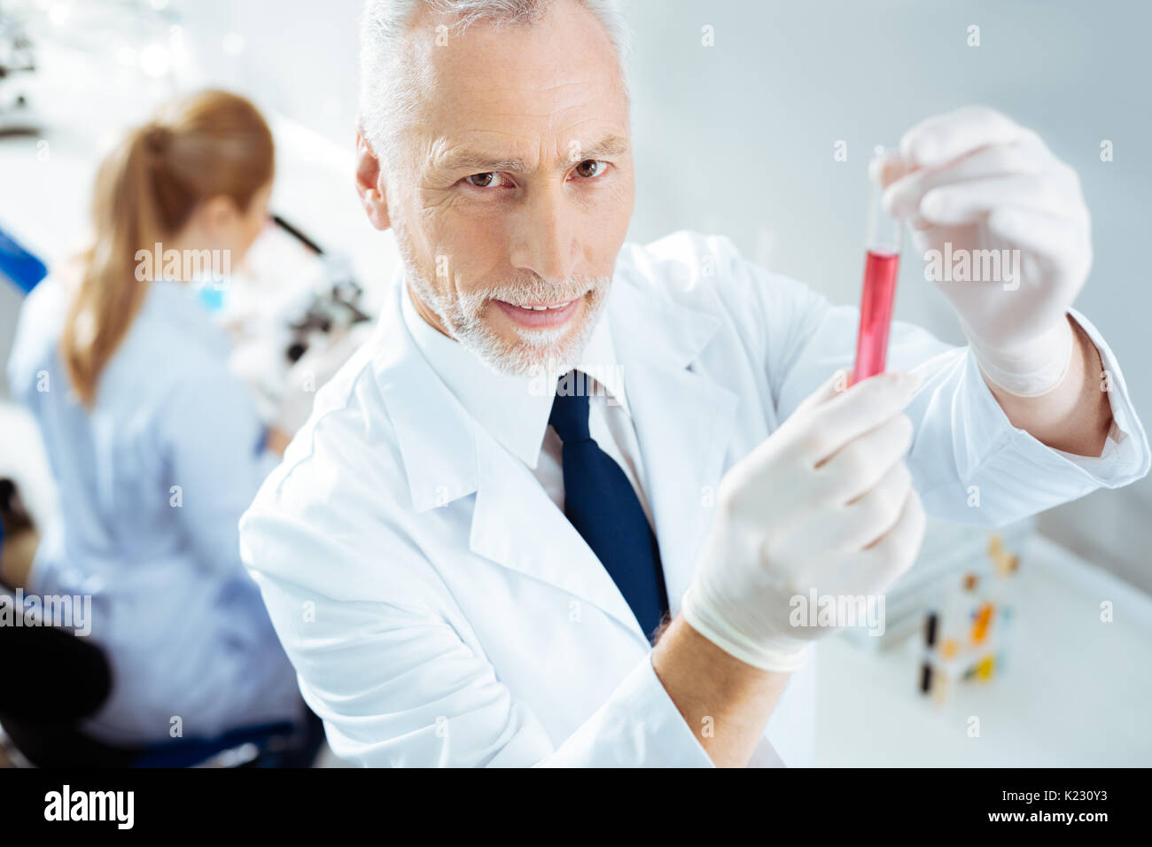 Positive delighted scientist looking at camera Stock Photo - Alamy