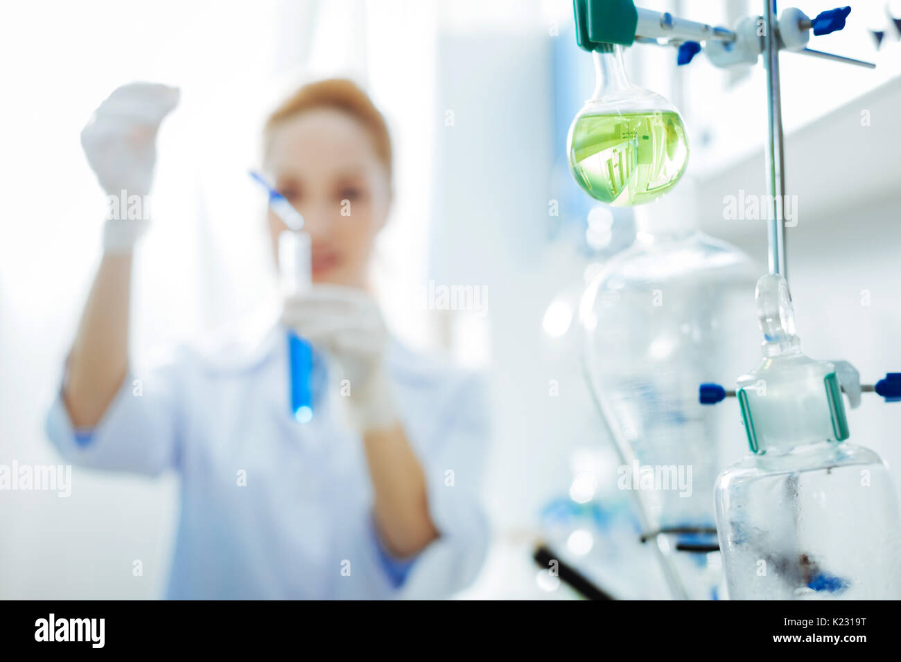 Close up of glass bottles being used for experiments Stock Photo - Alamy