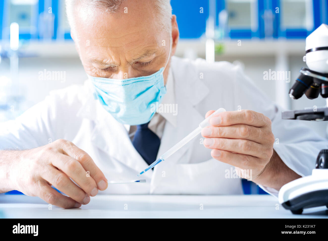 Confident practitioner working at his project Stock Photo - Alamy