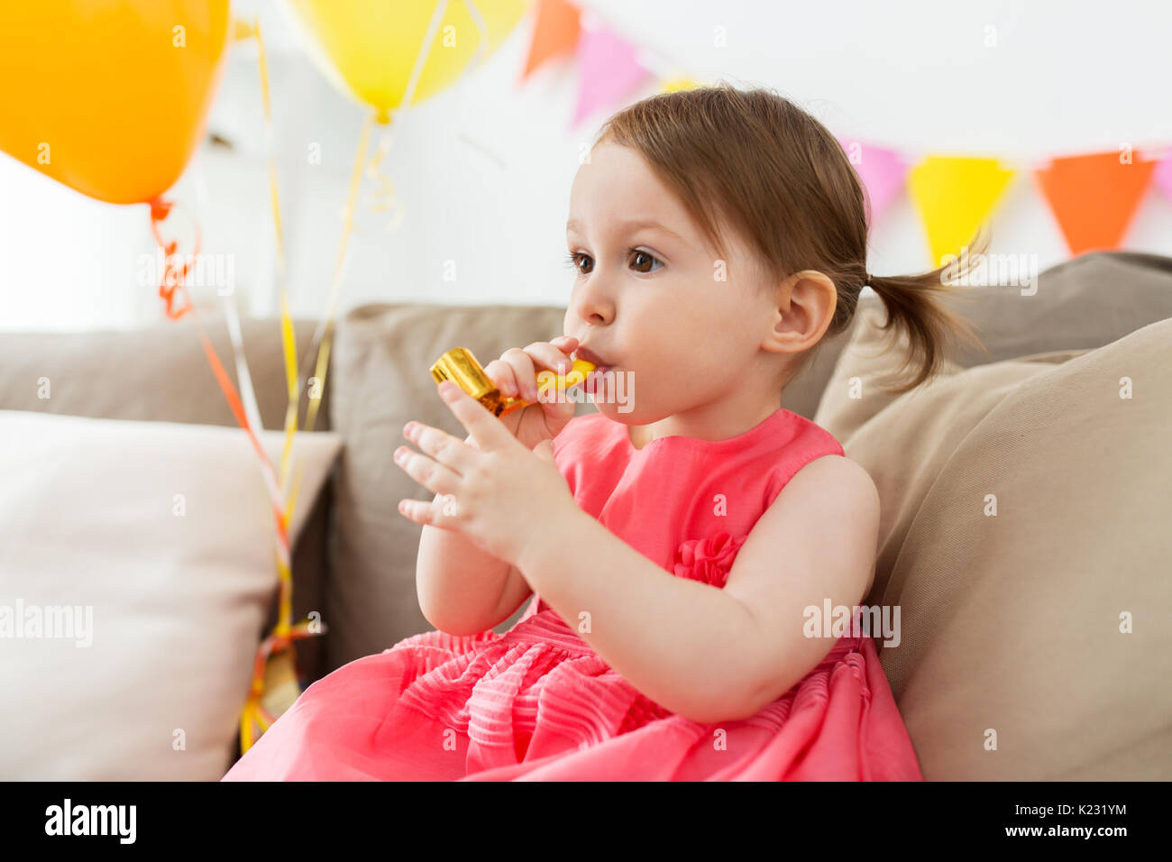 happy baby girl on birthday party at home Stock Photo - Alamy