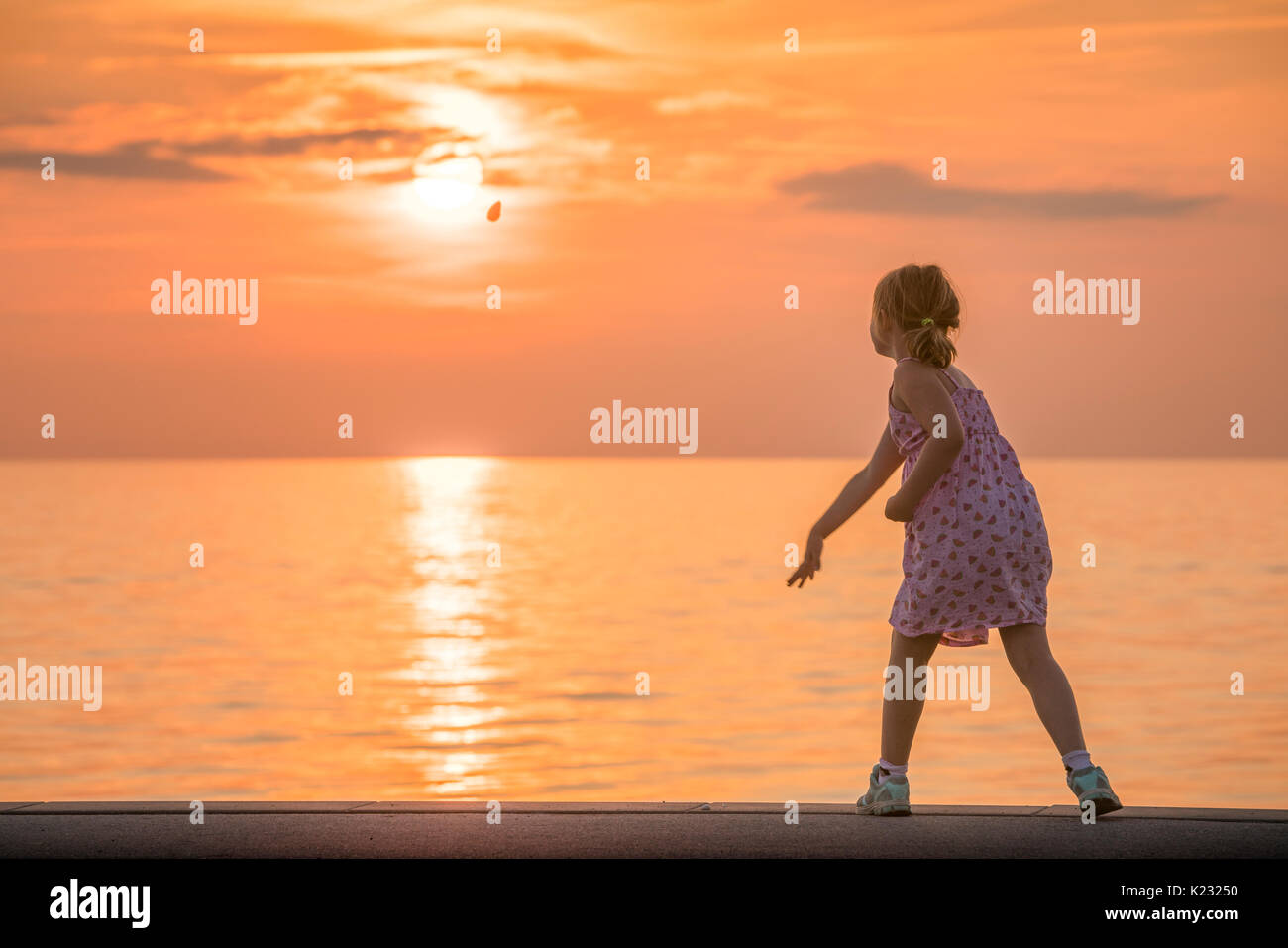 Children Throwing Stones High Resolution Stock Photography and Images ...