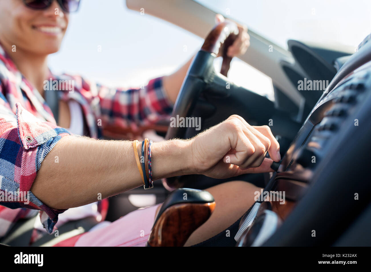 happy young man driving convertible car Stock Photo - Alamy