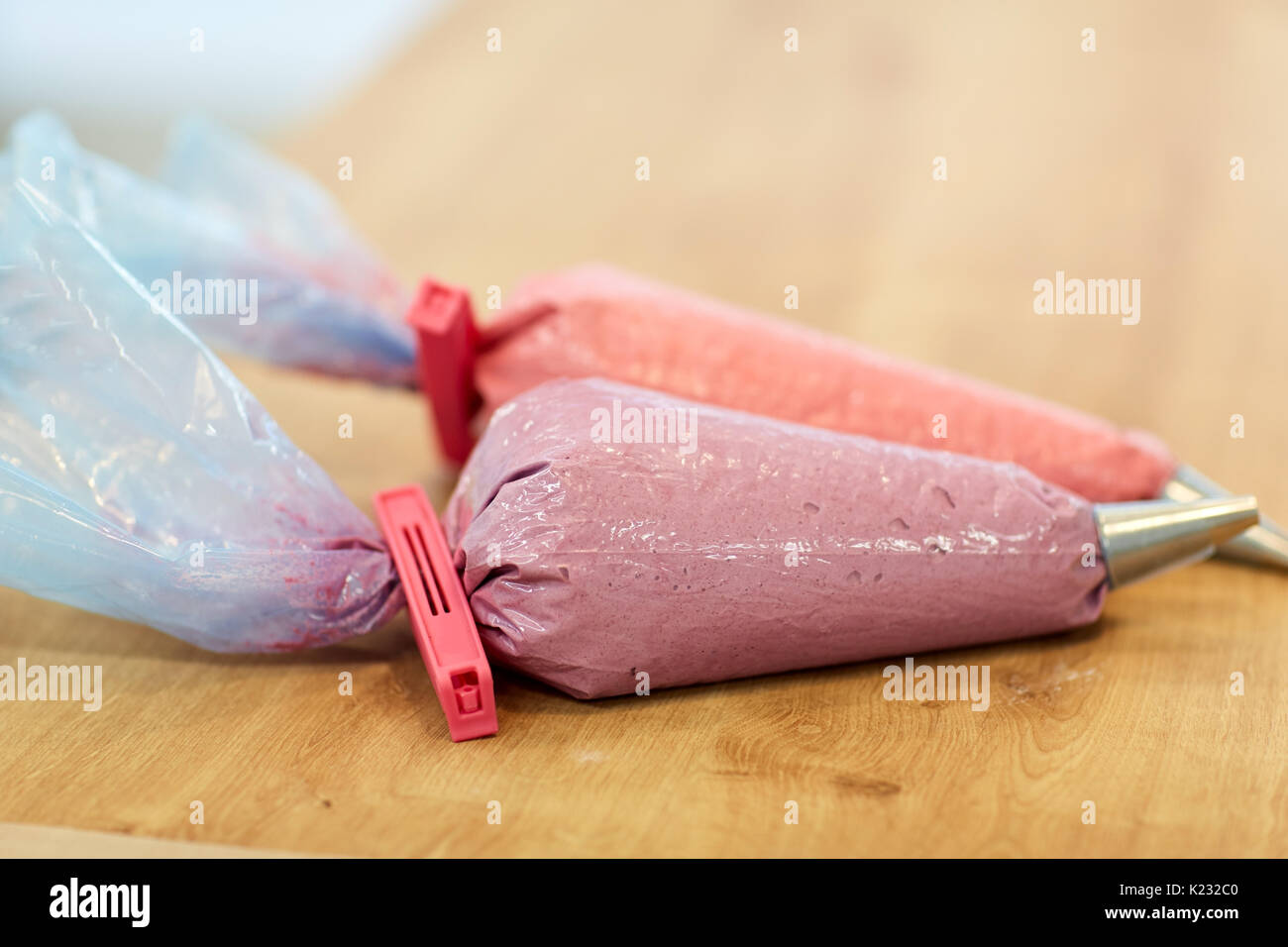 confectionery bags with macaron batter or cream Stock Photo - Alamy