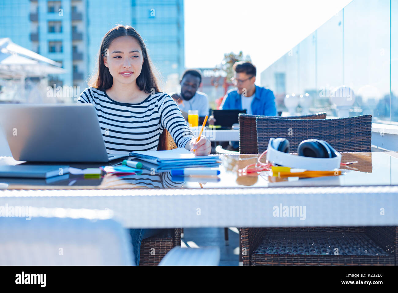 Smart asian girl studying outdoors Stock Photo - Alamy