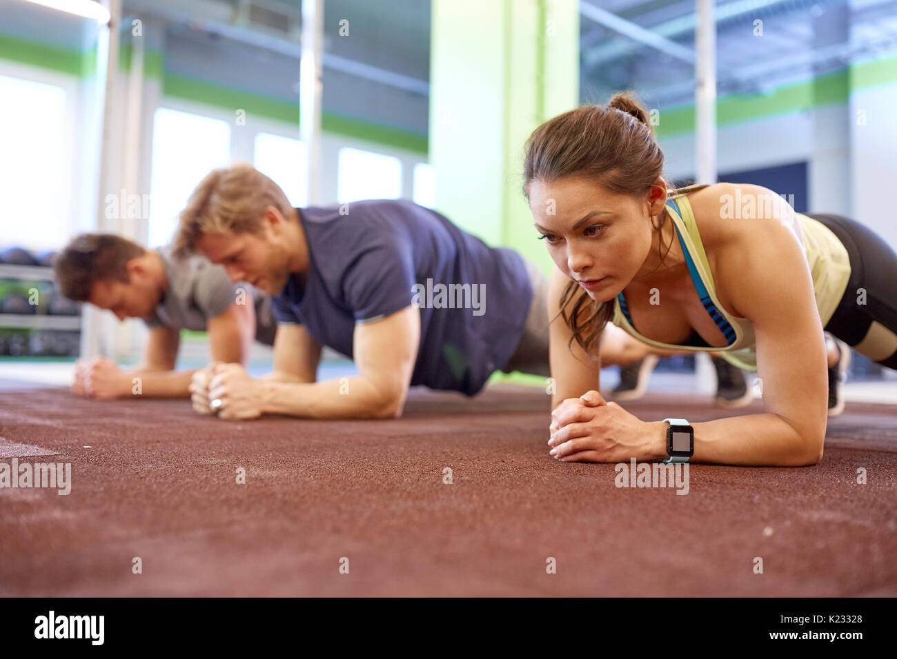 woman with heart-rate tracker exercising in gym Stock Photo - Alamy