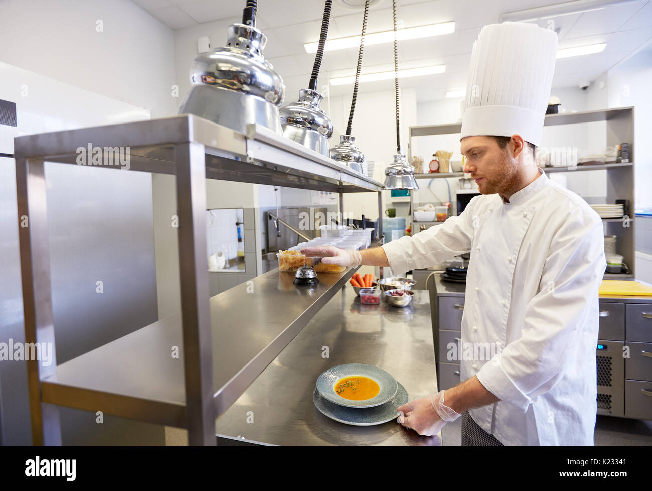 happy male chef cooking food at restaurant kitchen Stock Photo - Alamy