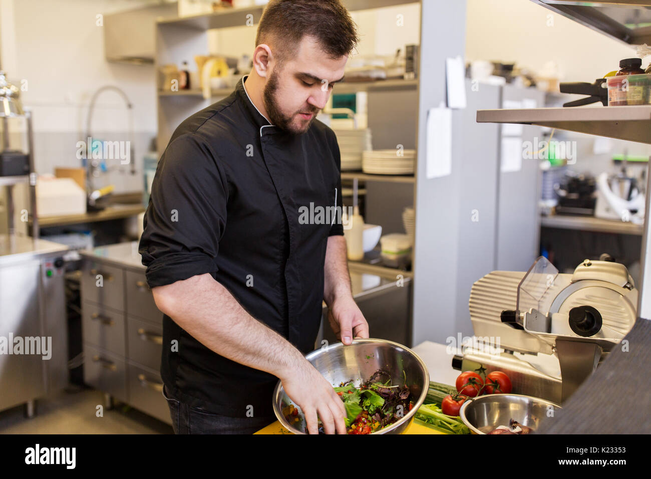 chef cook making food at restaurant kitchen Stock Photo - Alamy