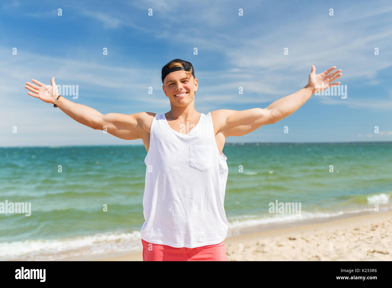 Smiling happy man beach sea summer hi-res stock photography and images ...