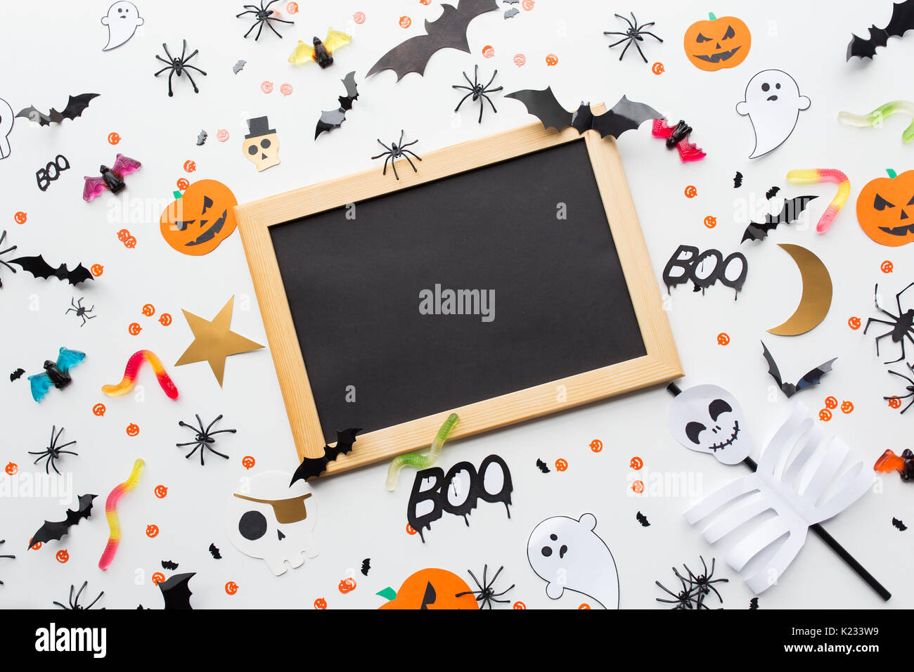 blank chalkboard and halloween party decorations Stock Photo - Alamy