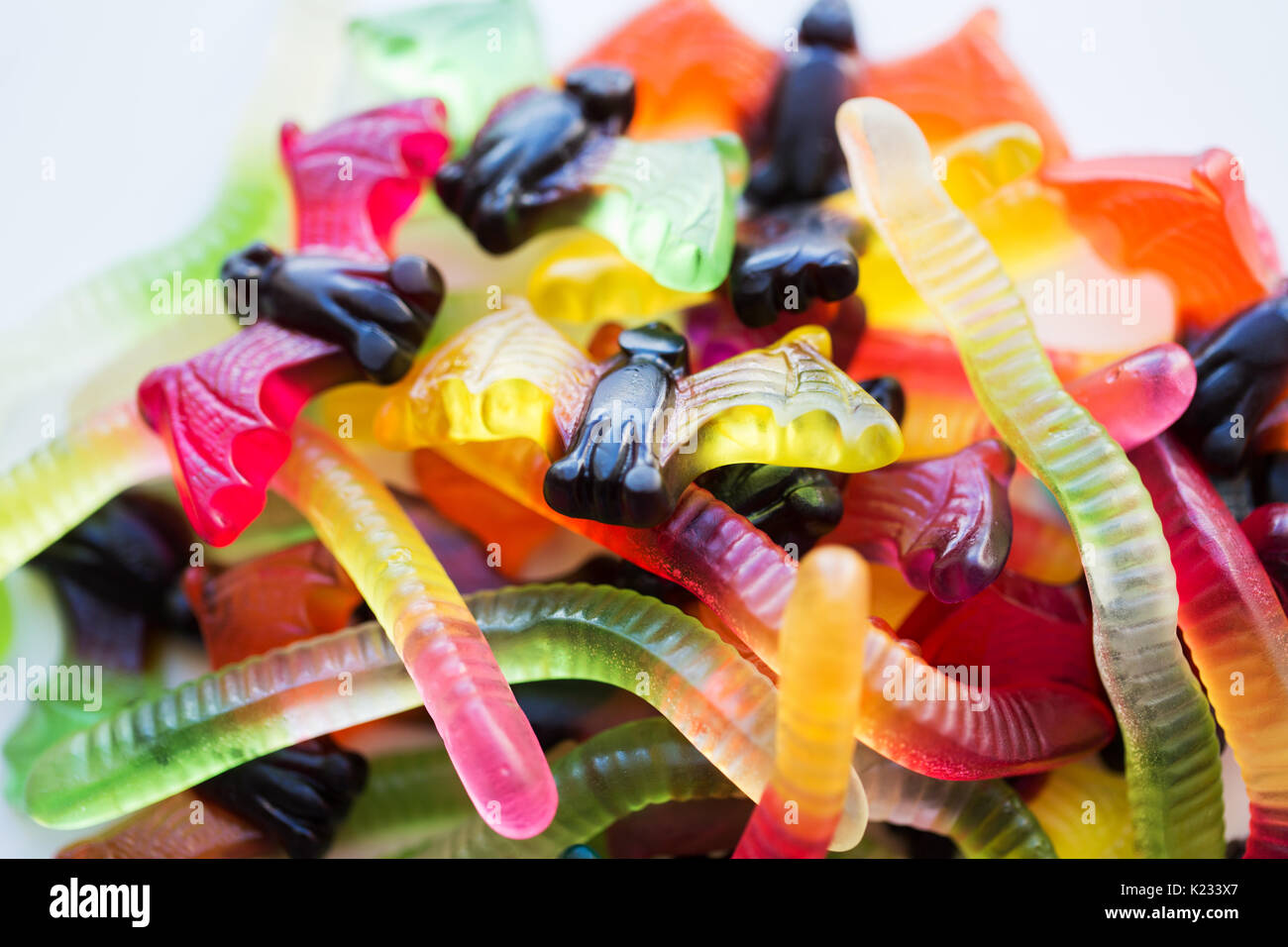 gummy worms and bet candies for halloween party Stock Photo - Alamy