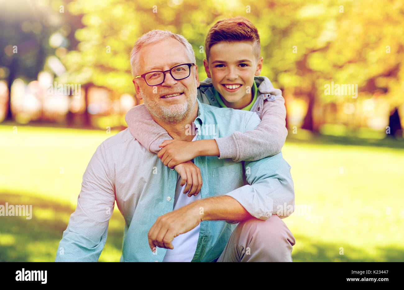Boy grandfather hug hi-res stock photography and images - Alamy