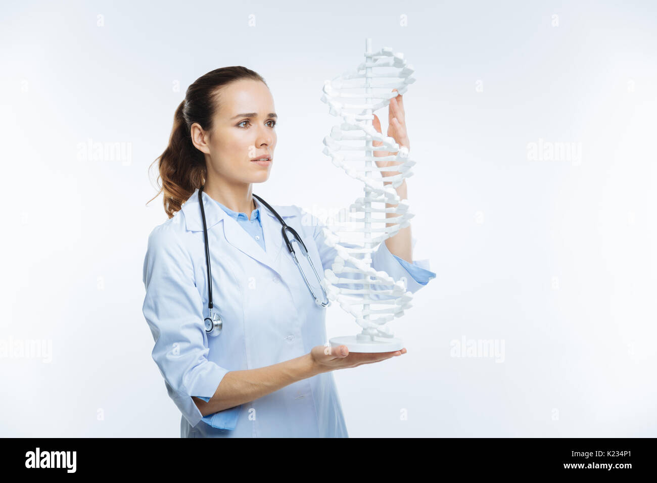 Female doctor dna molecule hi-res stock photography and images - Alamy