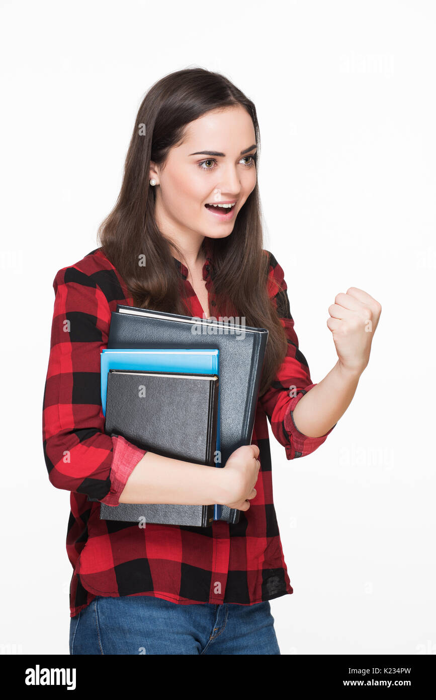 Attractive female student celebrating success. Student cheering ...