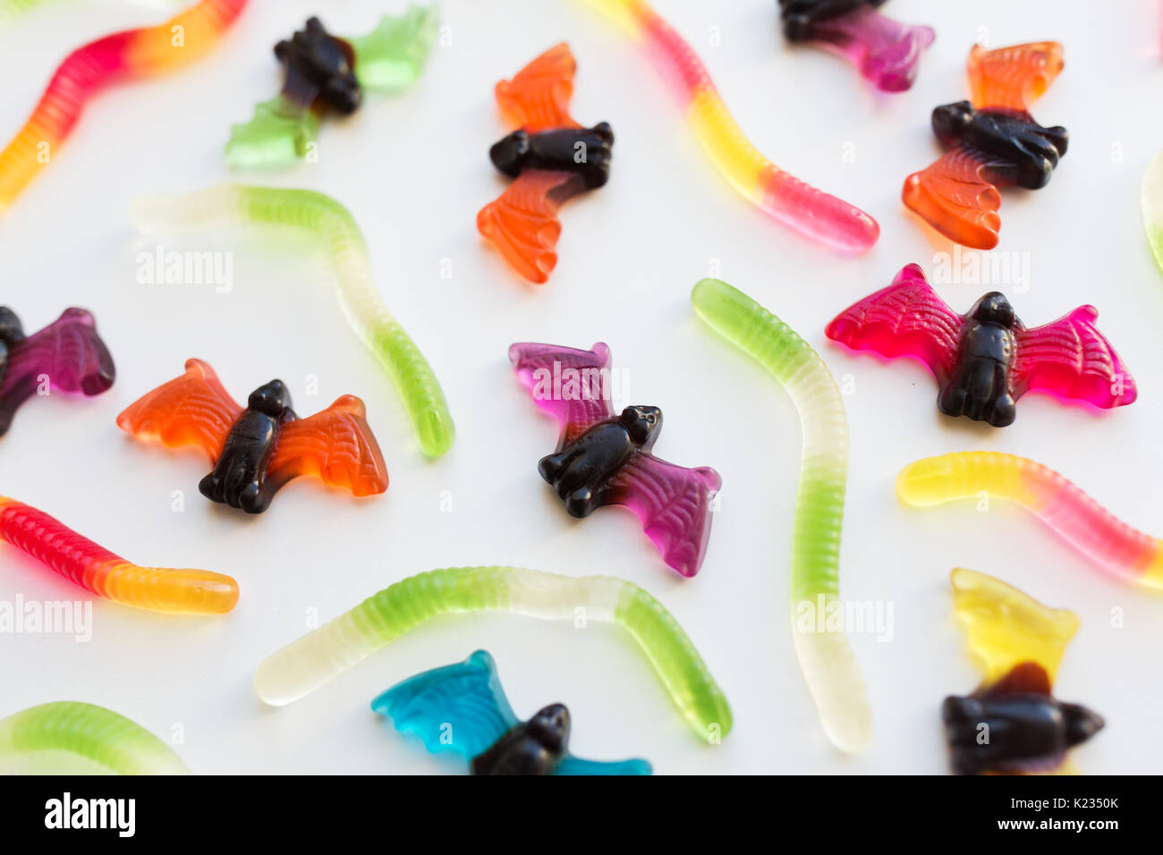 gummy worms and bet candies for halloween party Stock Photo - Alamy