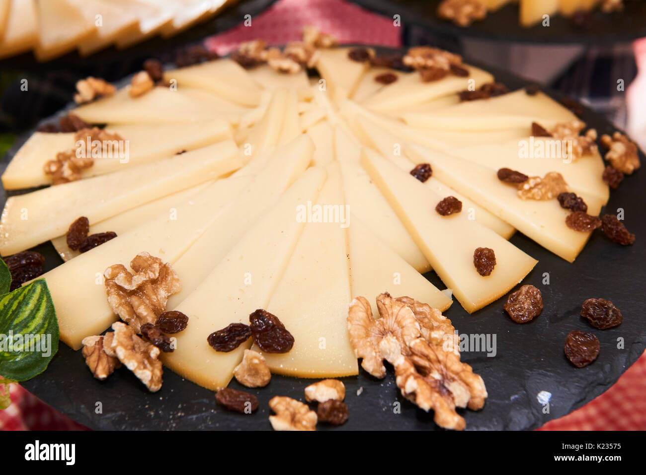 Cheese board with nuts Stock Photo - Alamy