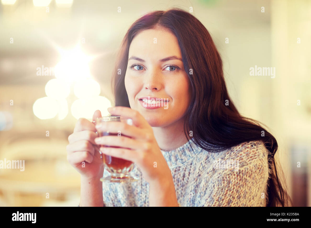 Smiling drinking tea hi-res stock photography and images - Alamy