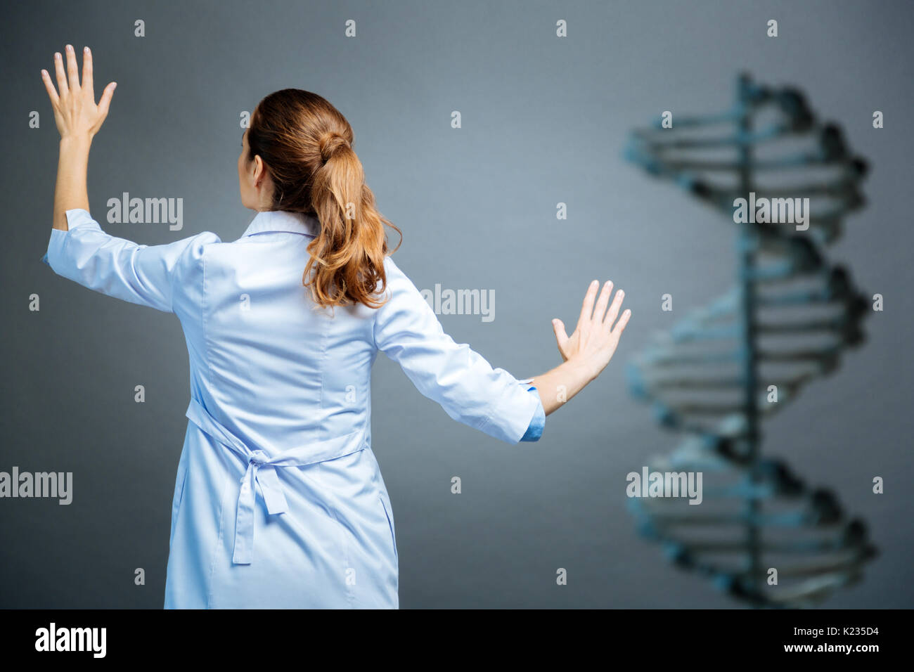 Female scientist working on genetic code Stock Photo - Alamy