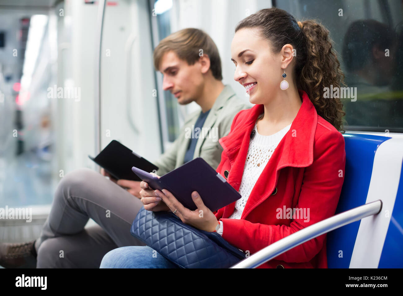Car passenger reading book hi-res stock photography and images - Alamy