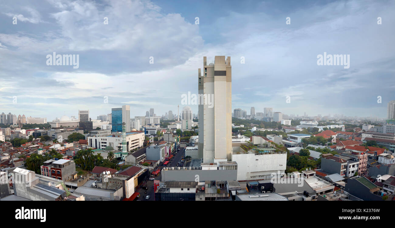 Portrait of jakarta cityscape with modern building against dramatic sky ...