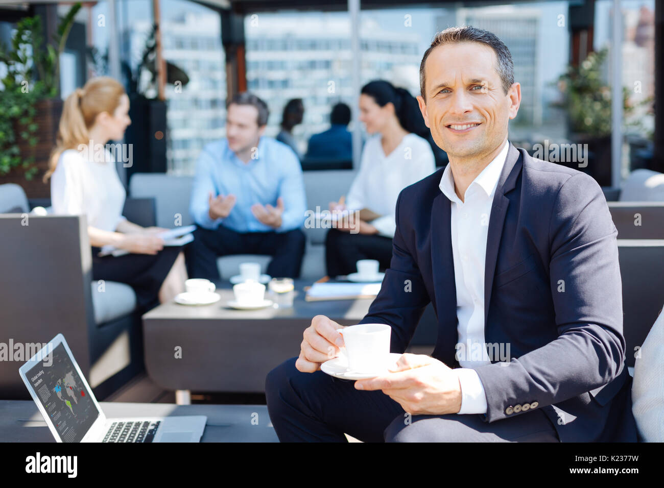 Joyful optimistic man dreaming about his success Stock Photo - Alamy