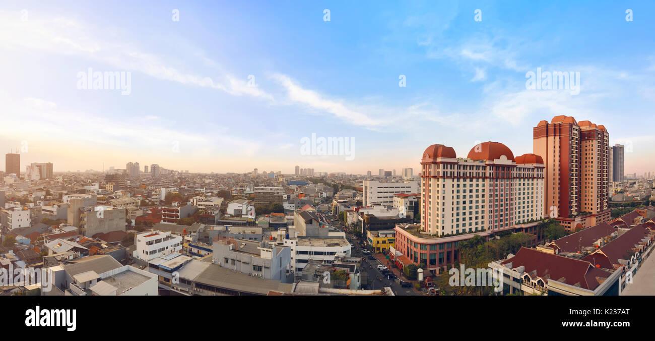 Portrait of jakarta cityscape with modern building against dramatic sky ...