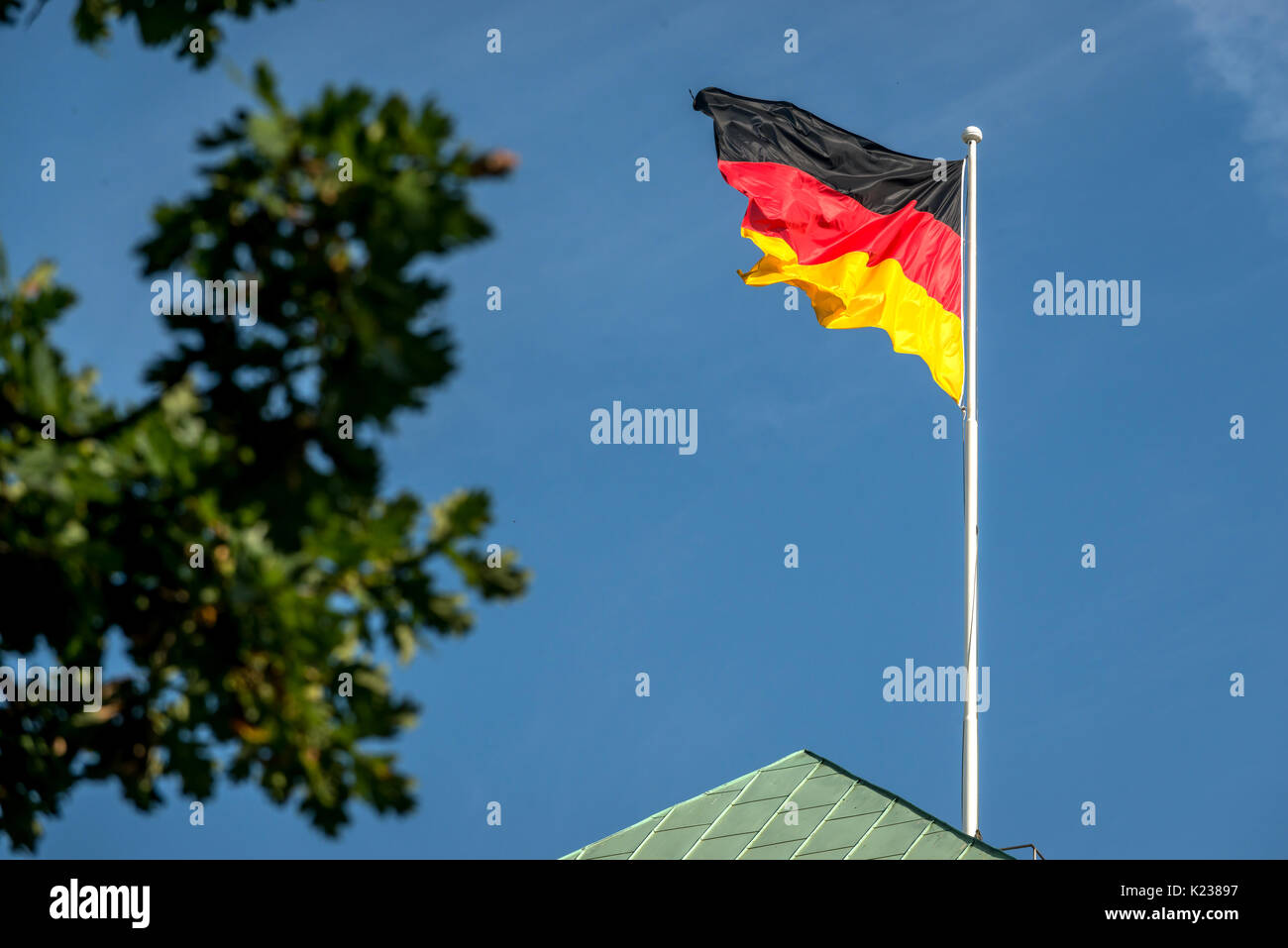 German flag flying in hi-res stock photography and images - Alamy