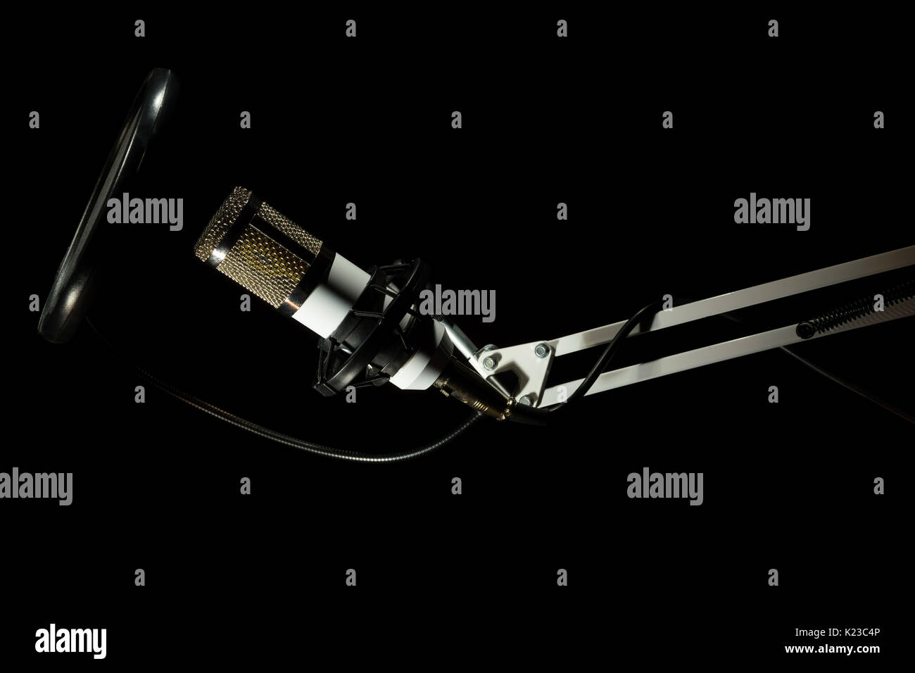 Professional condenser studio microphone on the black background Stock ...