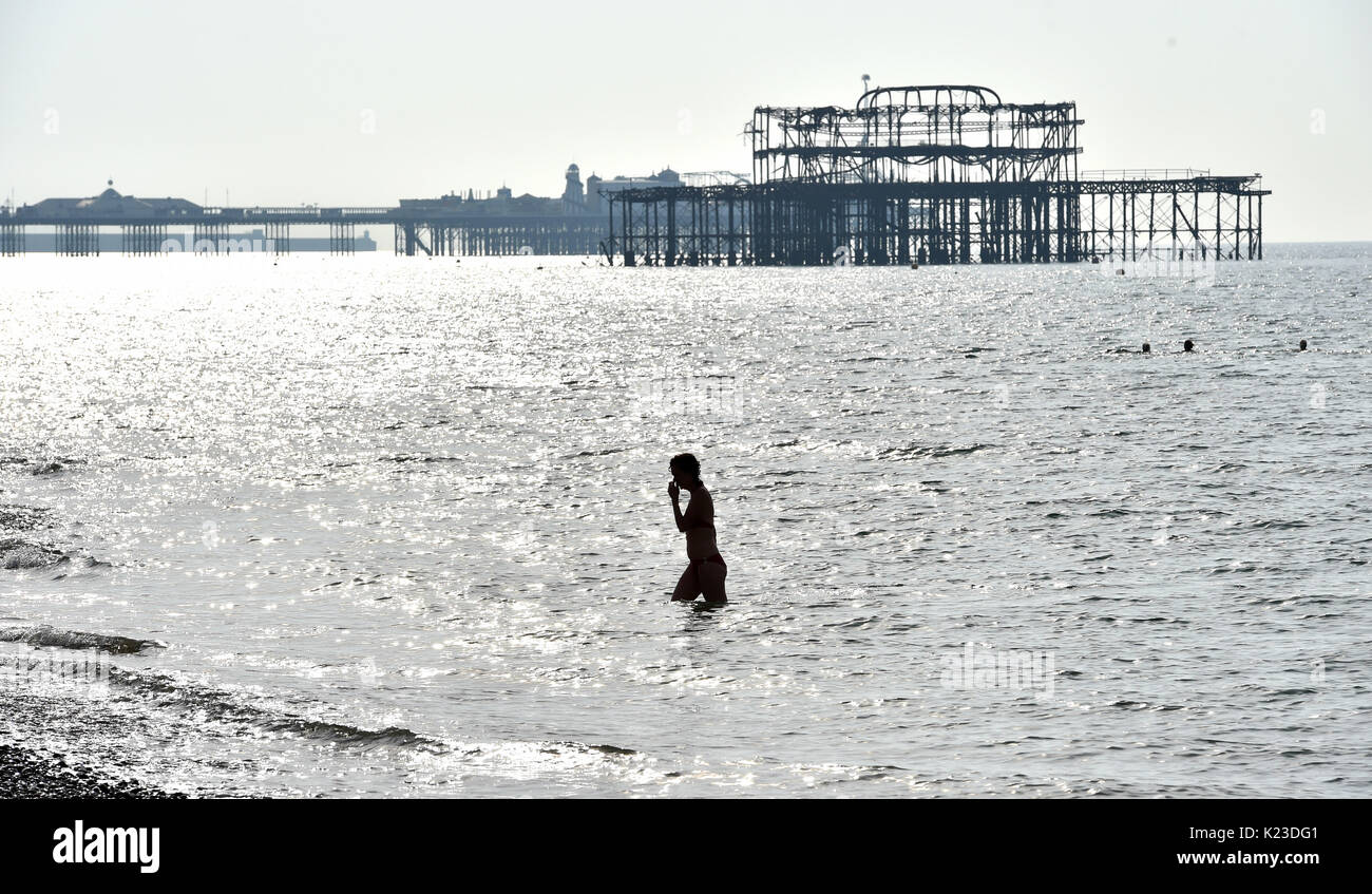 Swimmer walking out of the sea hi-res stock photography and images - Alamy