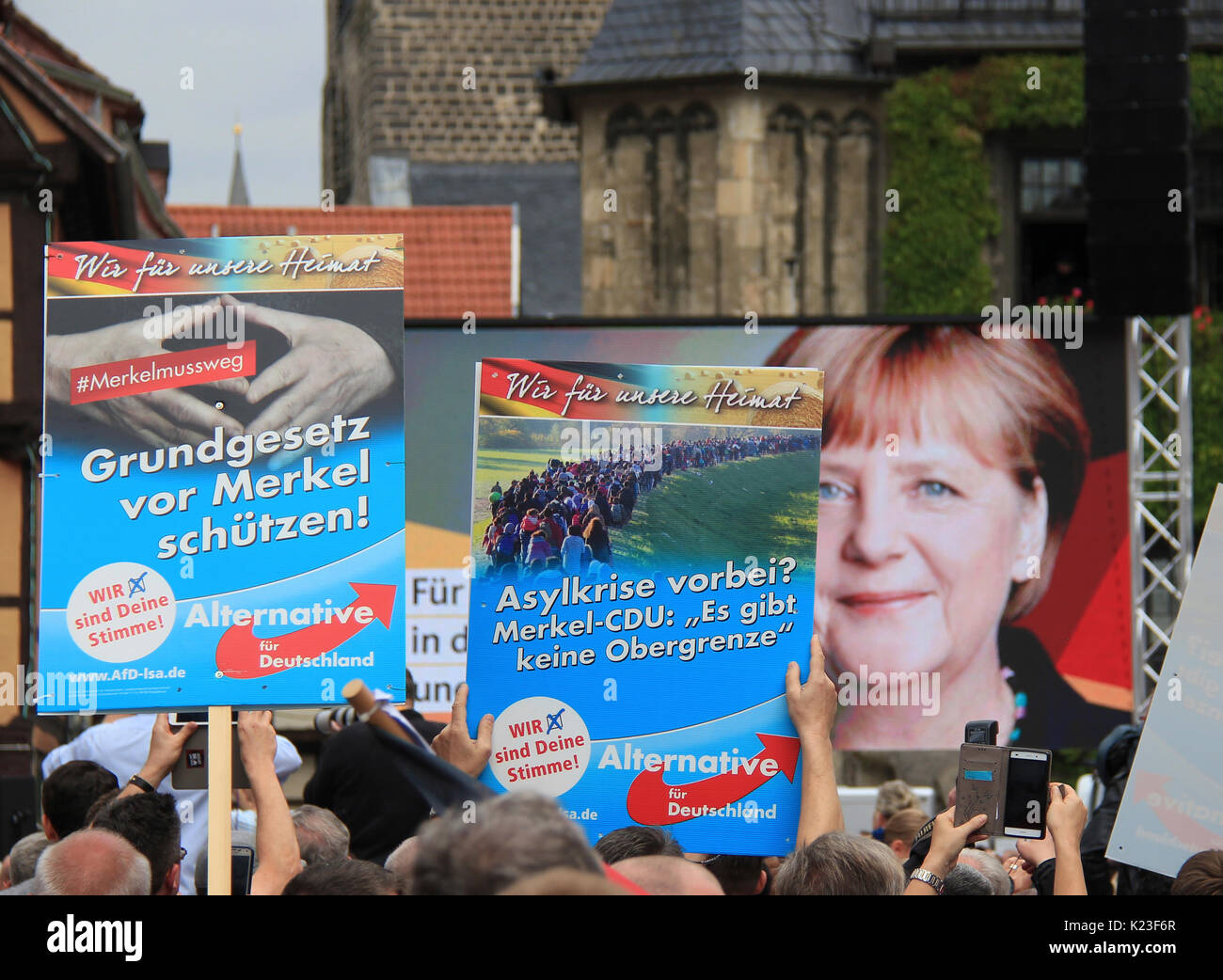 Demonstrators with signs of the AFD party during an election campaign ...