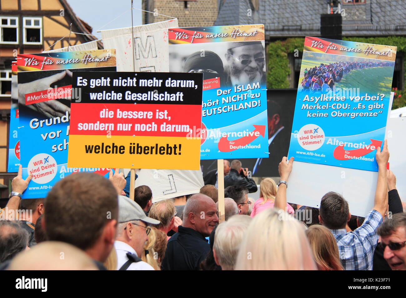 Demonstrators with signs of the AFD party during an election campaign ...