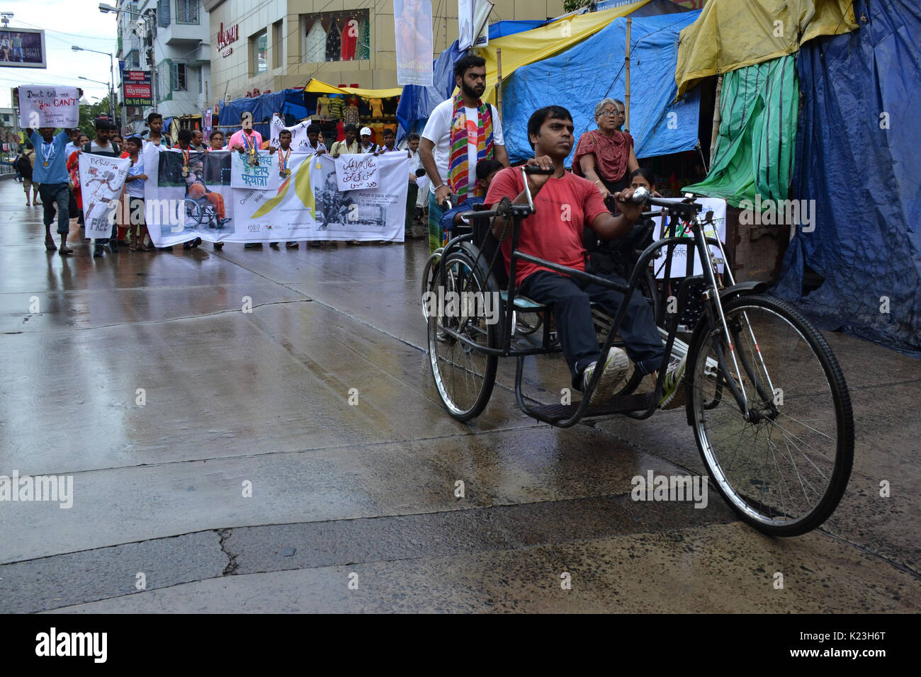 Calcutta,India,28th Aug'17.One physically disabled person leading the ...