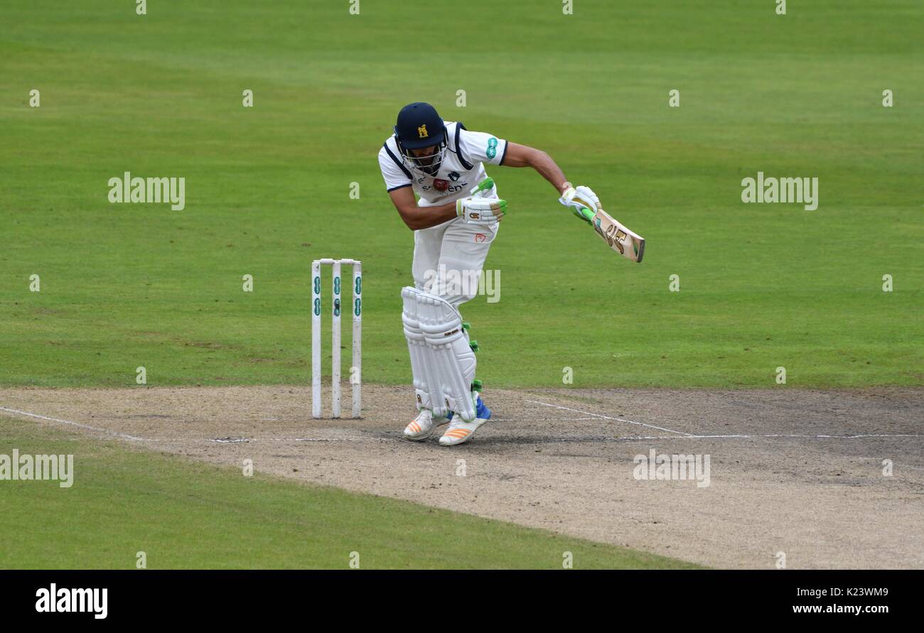 Manchester, UK. 30th Aug, 2017. Andrew Umeed is hit in the chest by the ...