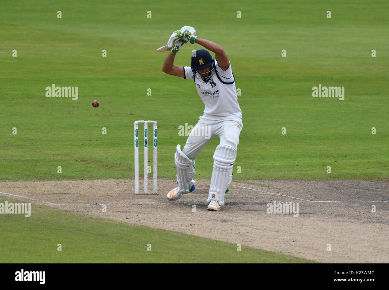 Manchester, UK. 30th Aug, 2017. Andrew Umeed shoulders the bat during ...