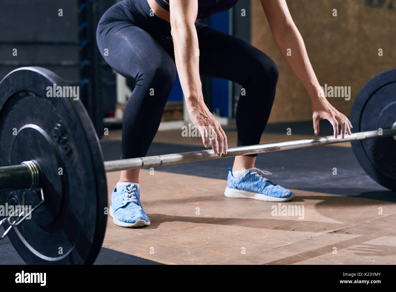 Beautiful Woman Lifting Heavy Barbell Stock Photo - Alamy