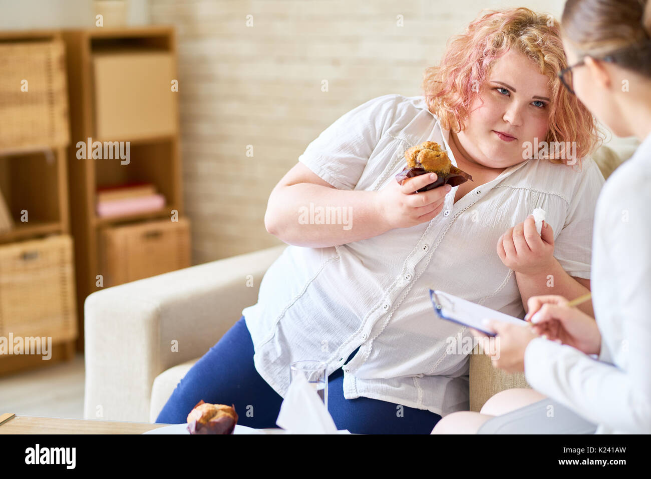 Fat woman eating hi-res stock photography and images - Alamy
