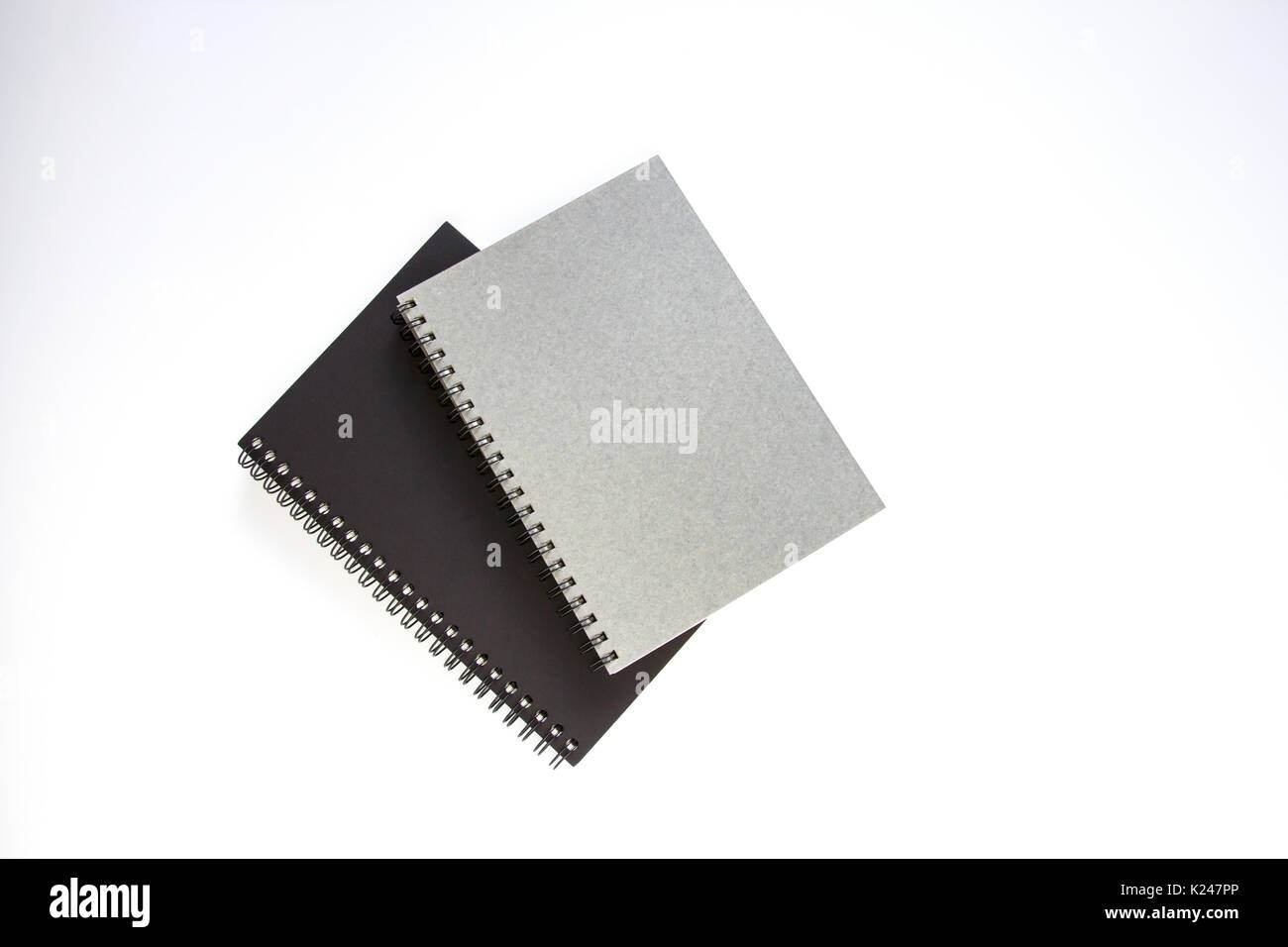Notebooks on white background Stock Photo - Alamy