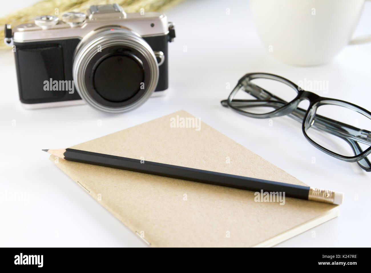 Camera glasses notepad pencil on hi-res stock photography and images ...