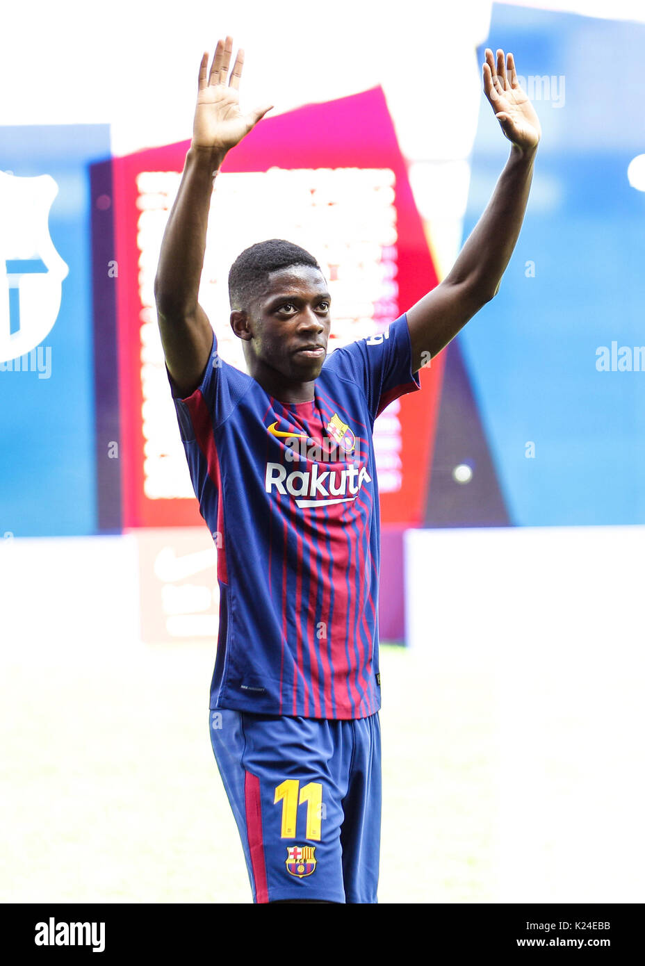 FC Barcelona's new signing Ousmane Dembele gestures during his official ...