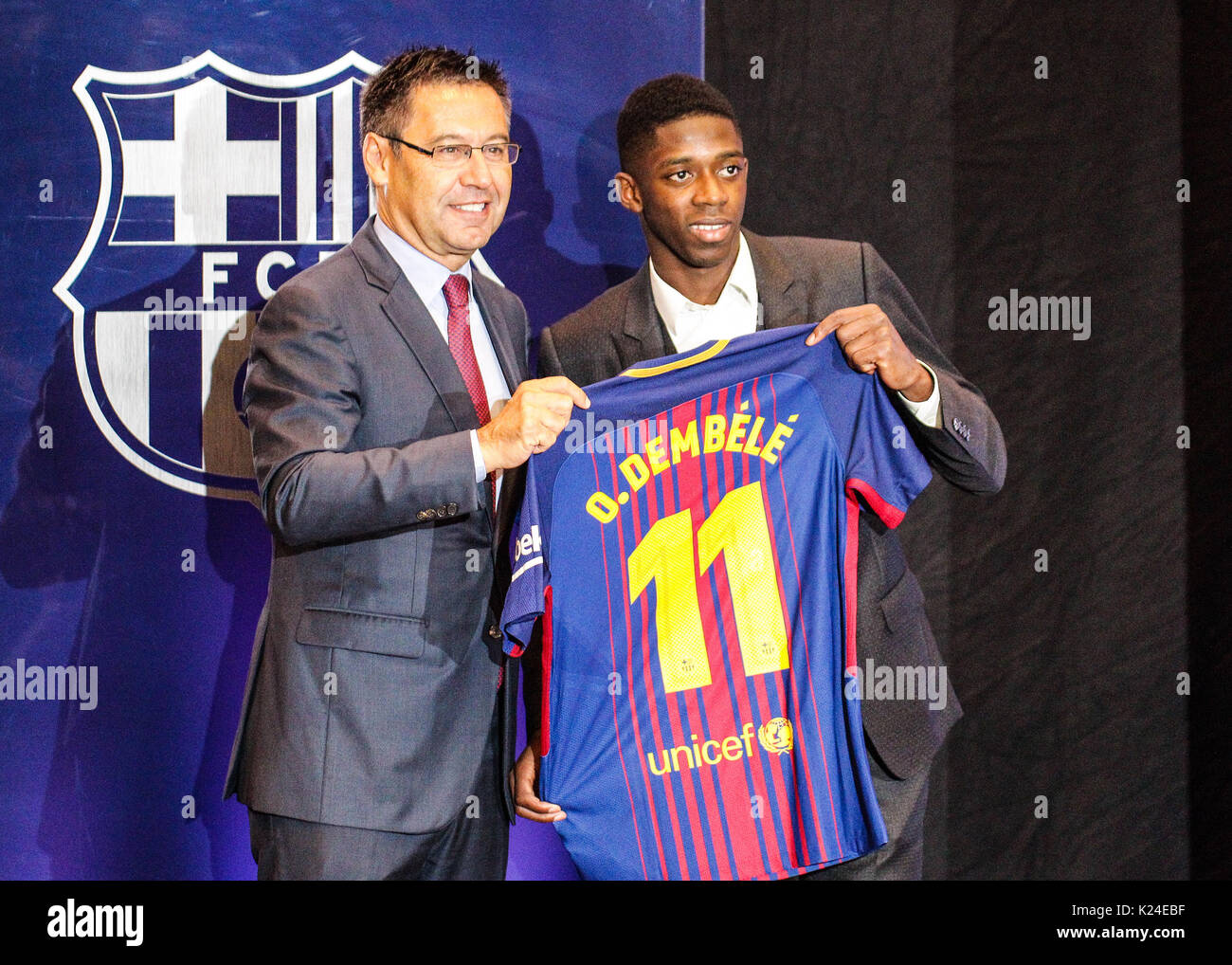 FC Barcelona's new signing Ousmane Dembele gestures during his official ...