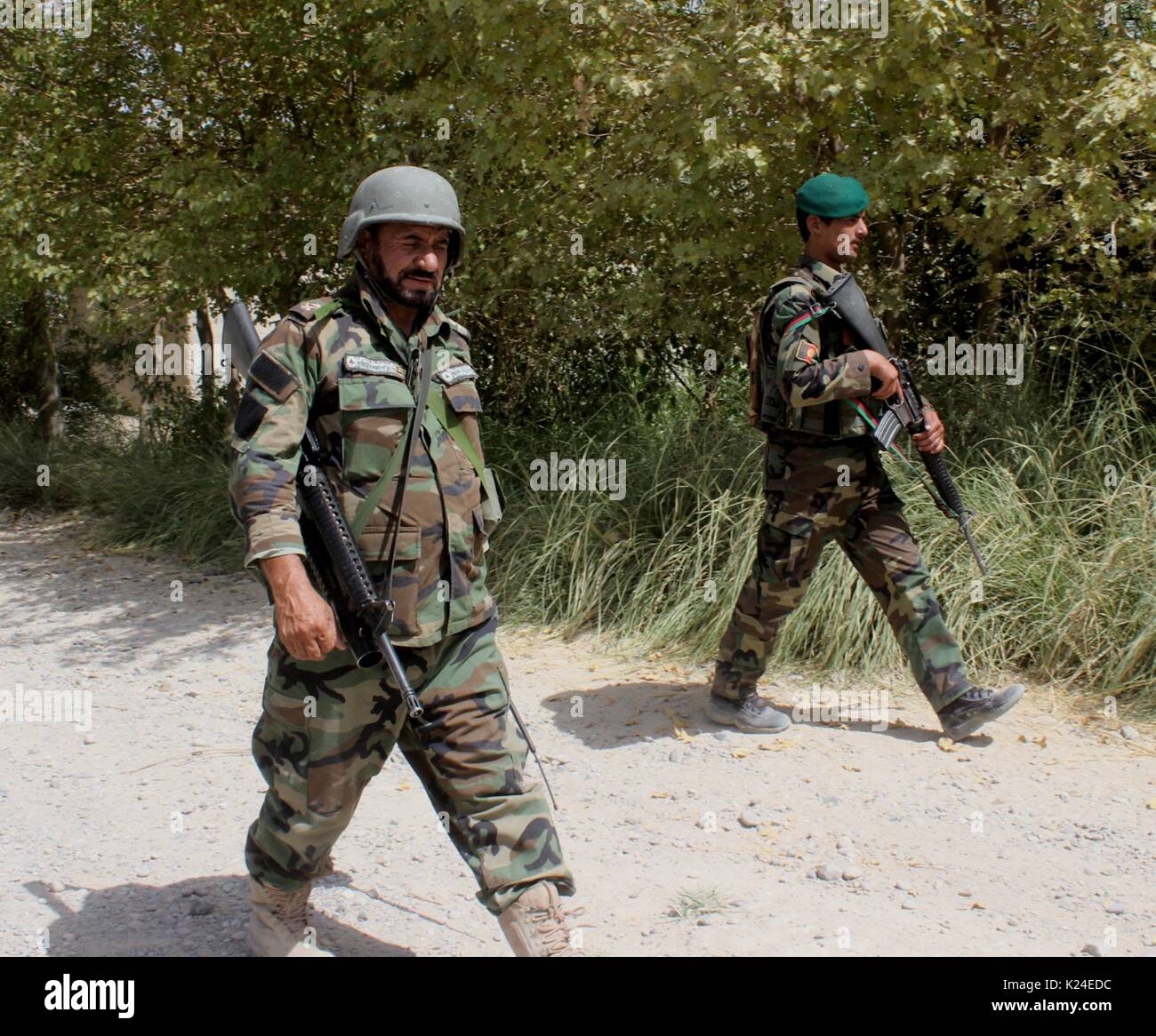 Lashkar Gah, Afghanistan. 27th Aug, 2017. Afghan army soldiers walk ...